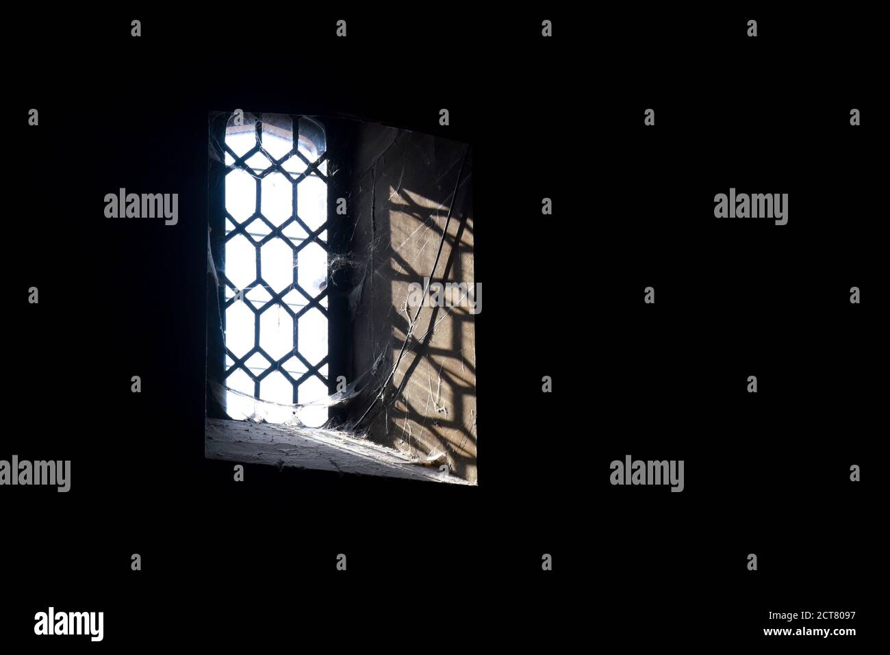 Haunted house window with dark shadows and cobwebs Stock Photo - Alamy