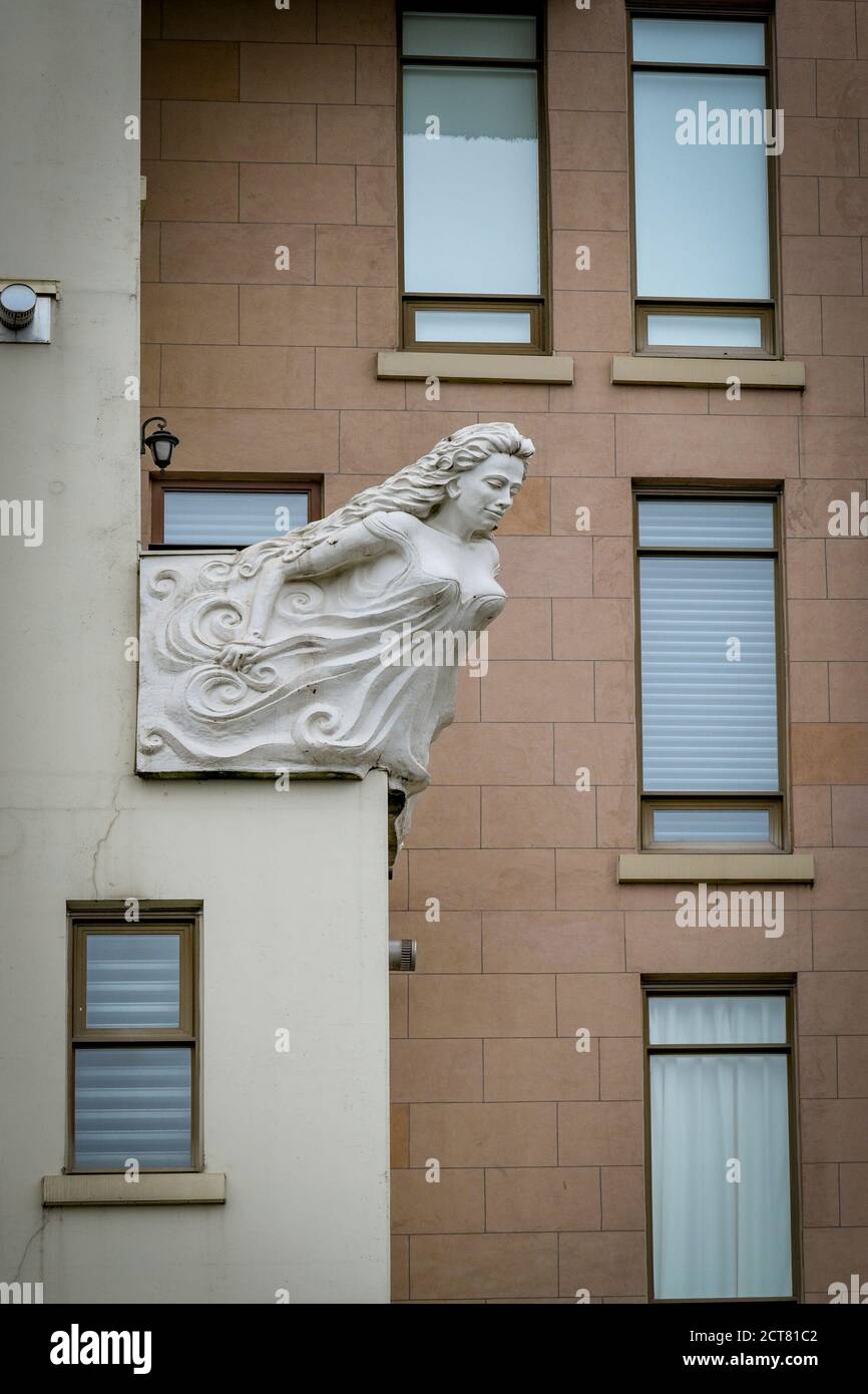 Womans Figure, one of the Four Winds by artist Derek Rowe, Grace Tower ...