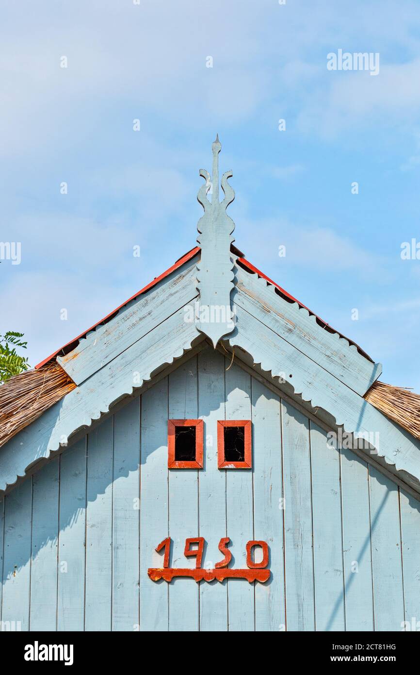 Beautiful wooden decoration on the traditional fronton house in Danube ...