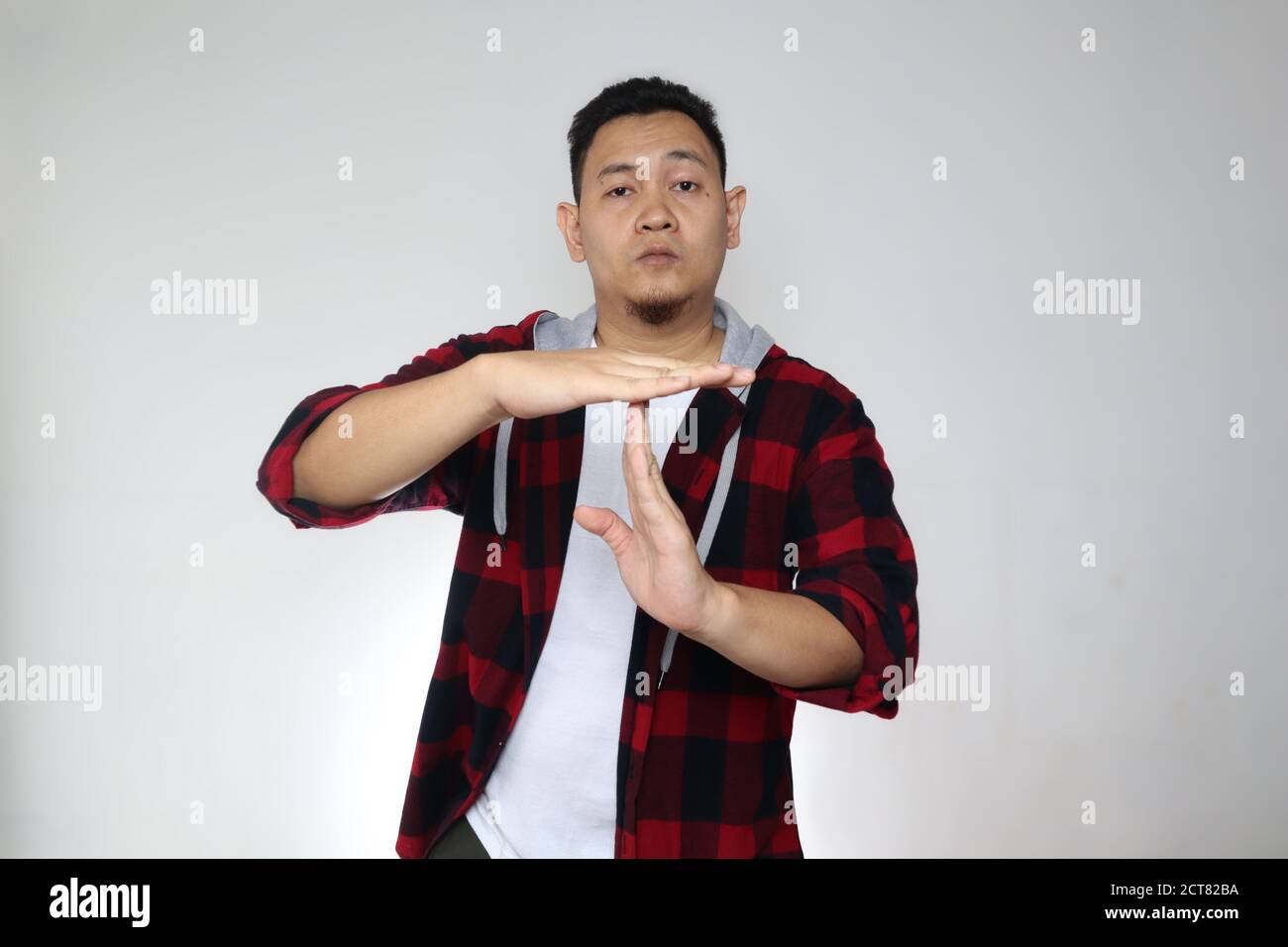 Young Asian man making time out gesture, take a break concept Stock ...