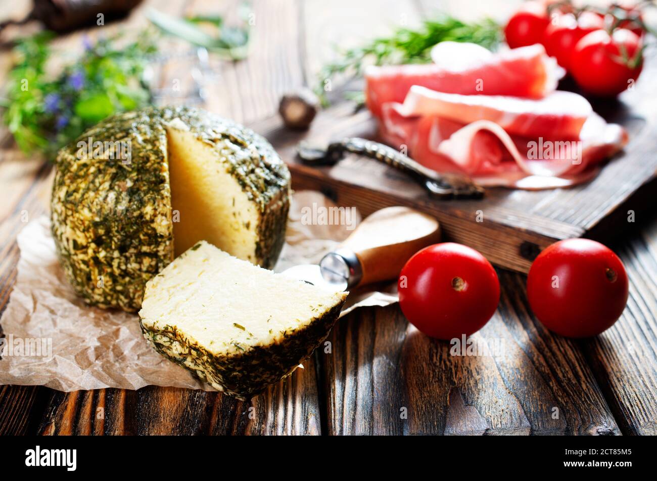 cheese with hamon aroma spice and fresh tomato Stock Photo - Alamy