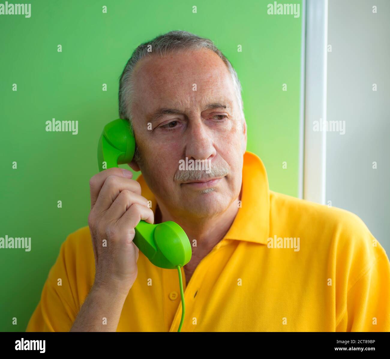 Landline phone man hi-res stock photography and images - Alamy