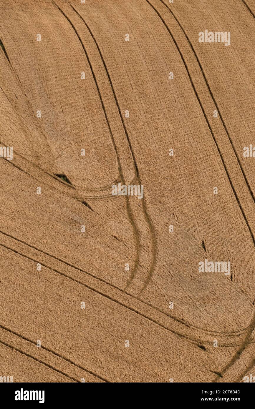 Aerial view of tractor tracks in field Stock Photo - Alamy
