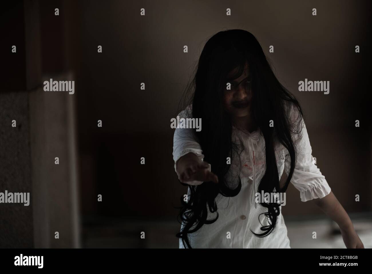Girl zombie in blood. Asian Woman ghost with blood. Horror scary fear ...
