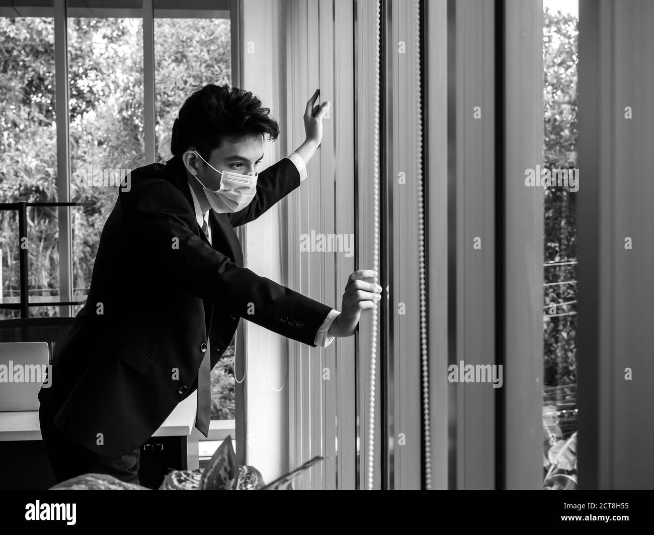 Thinking pensive man outside office Black and White Stock Photos ...