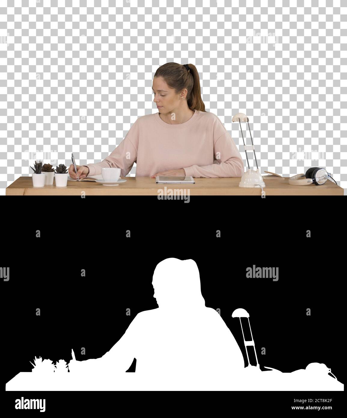 Happy student studying and learning taking notes from a digital Stock ...