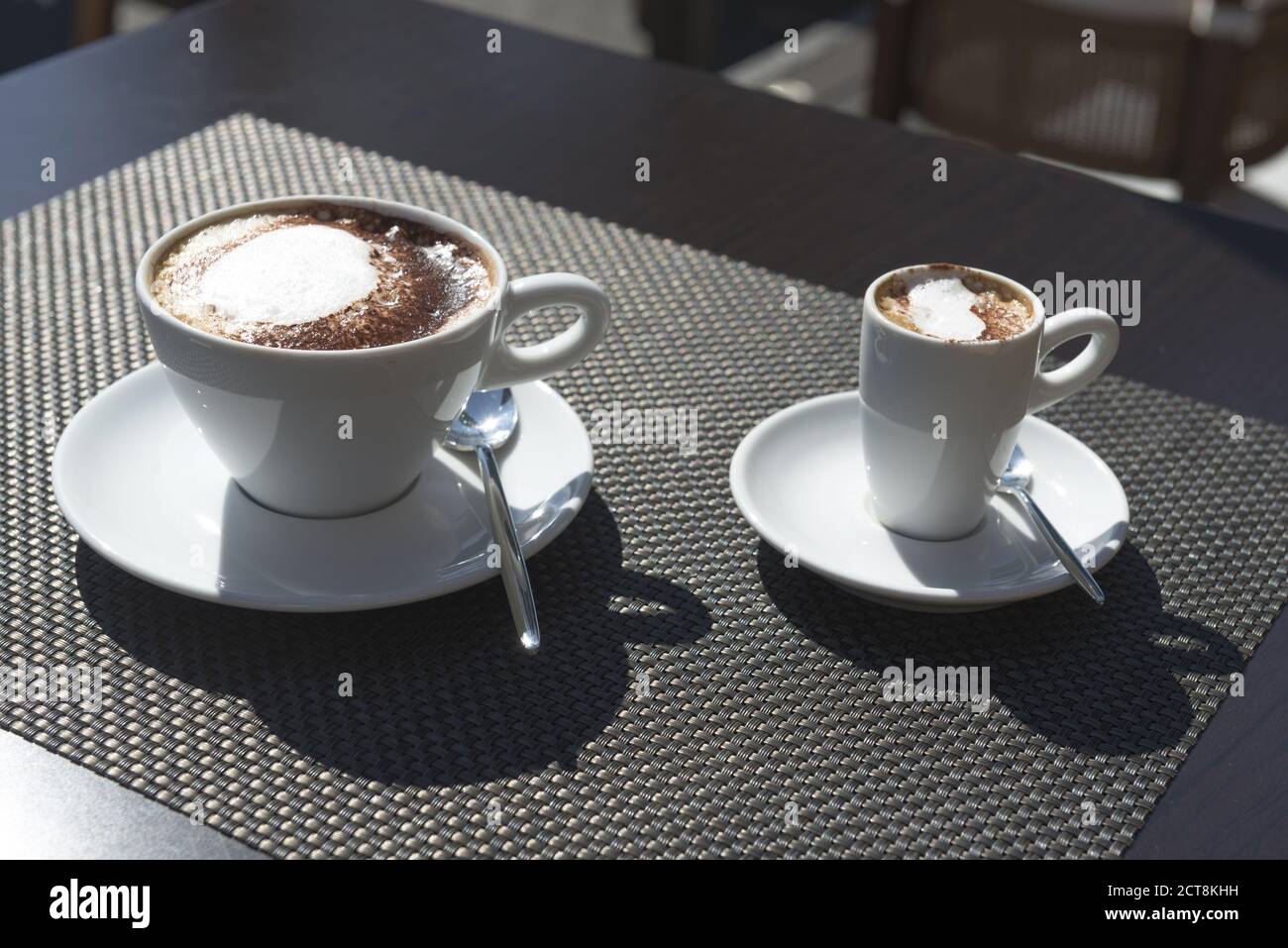 Big and Small Cappuccino Coffee Stock Photo - Alamy