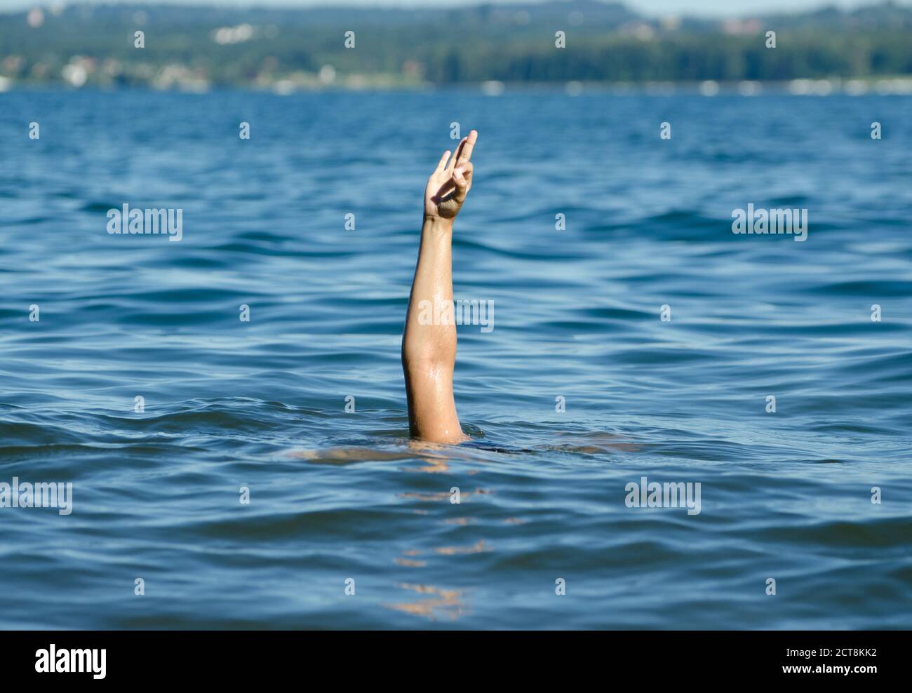 Woman in the Water and Showing the Thumb Up Stock Photo - Alamy