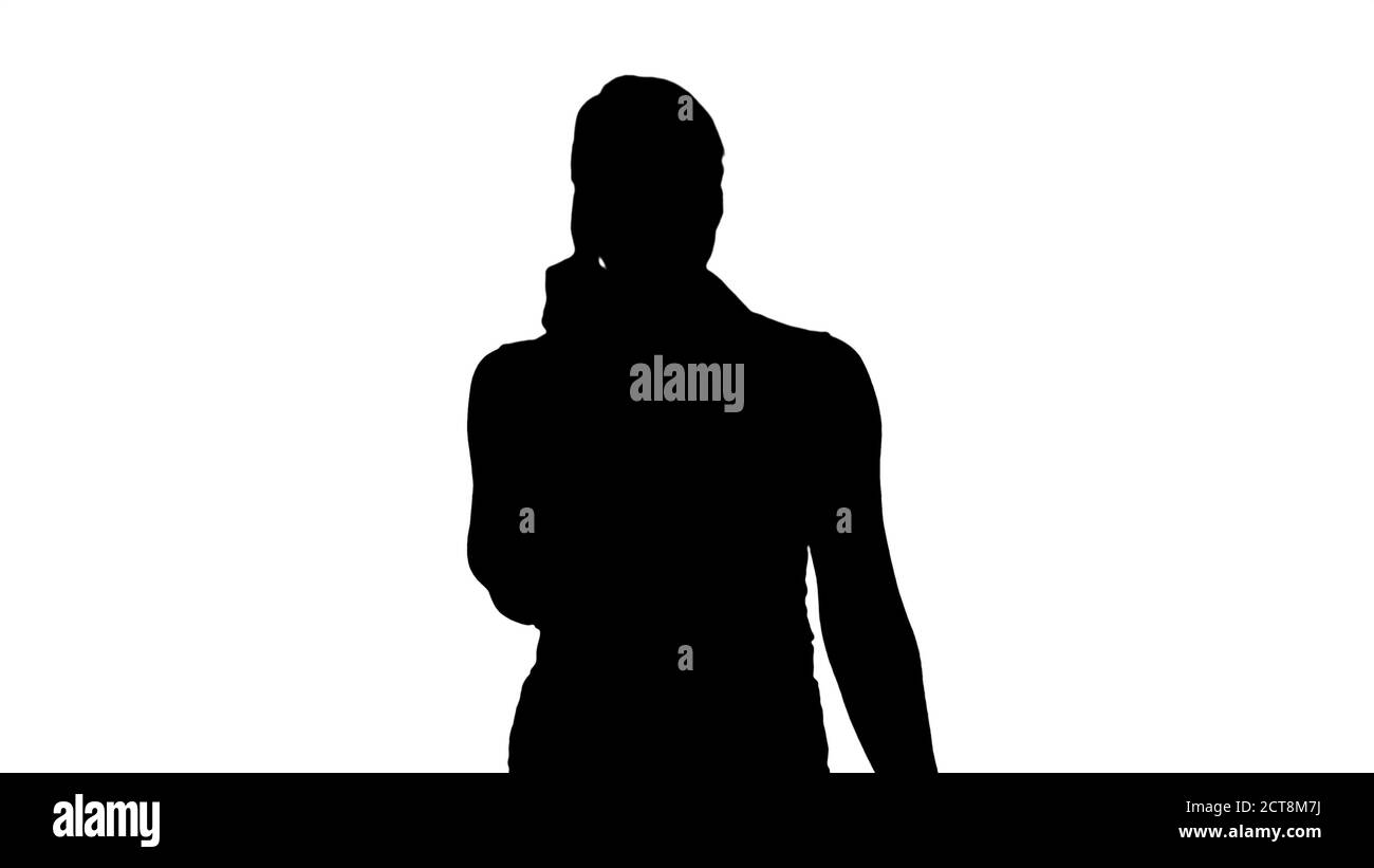 Silhouette Charming woman calling with cell telephone while walk Stock ...