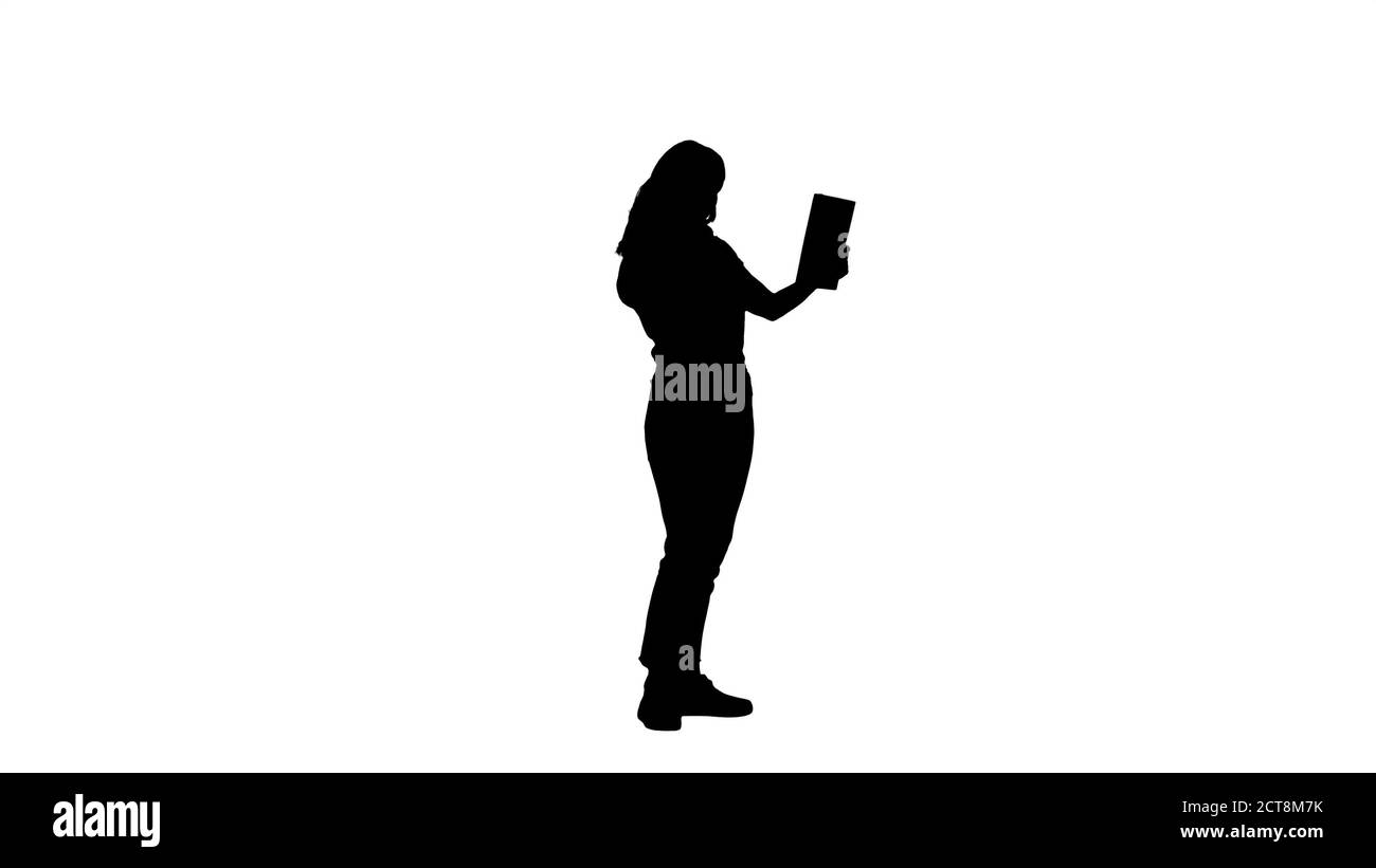 Silhouette Beautiful woman making video call with tablet Stock Photo ...