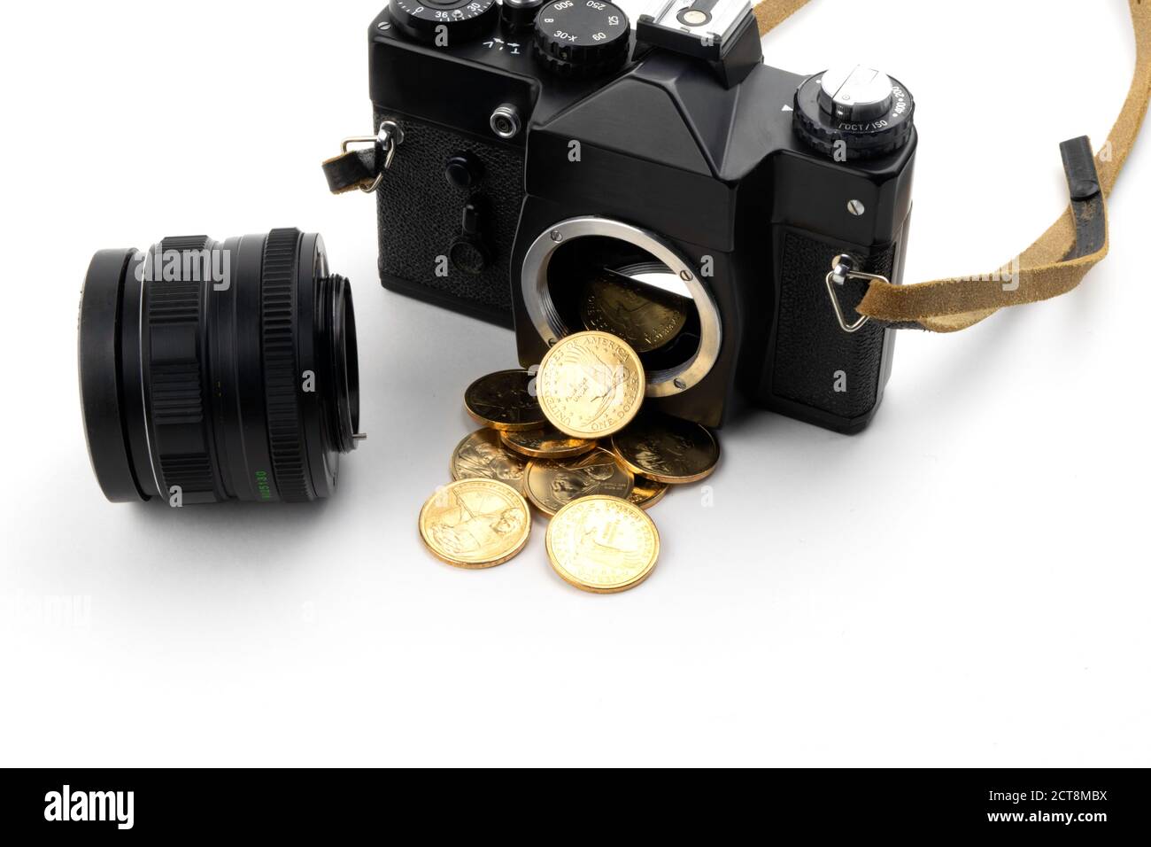camera with dollars pouring from it on a white background Stock Photo ...