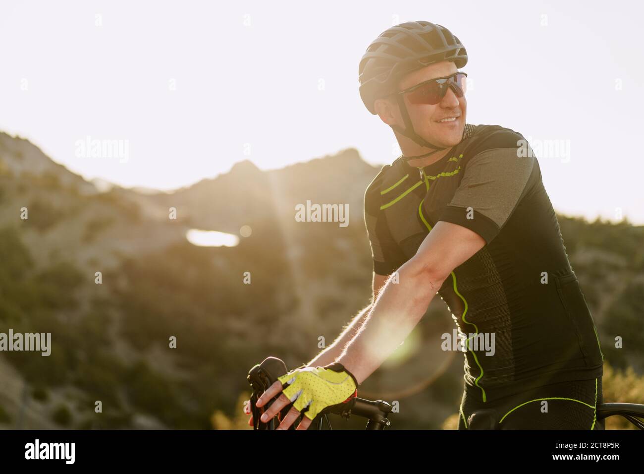 Portrait of male caucasian cyclist with helmet and glasses Stock Photo ...