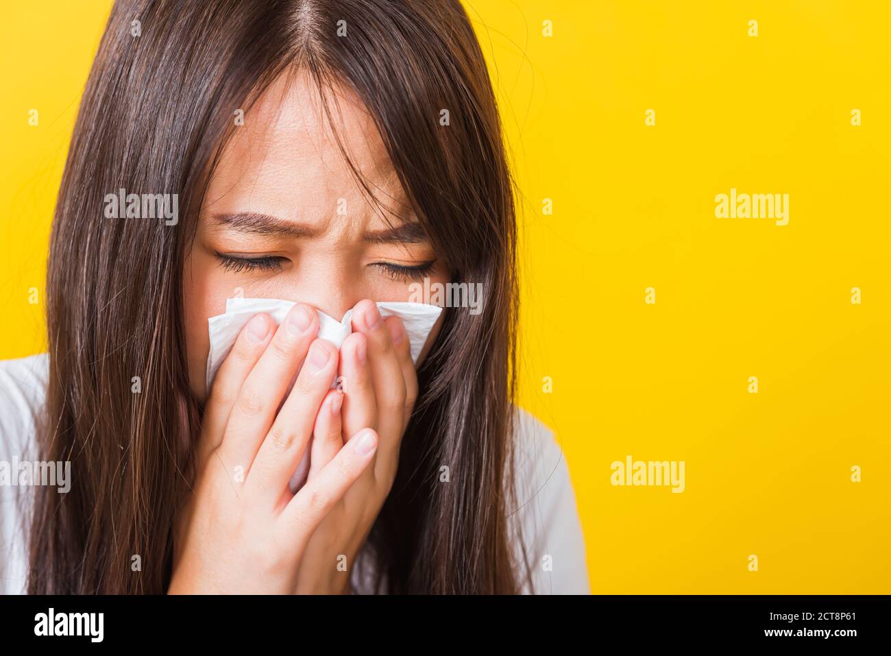 Portrait of Asian beautiful young woman sad she crying wipe the mucus ...