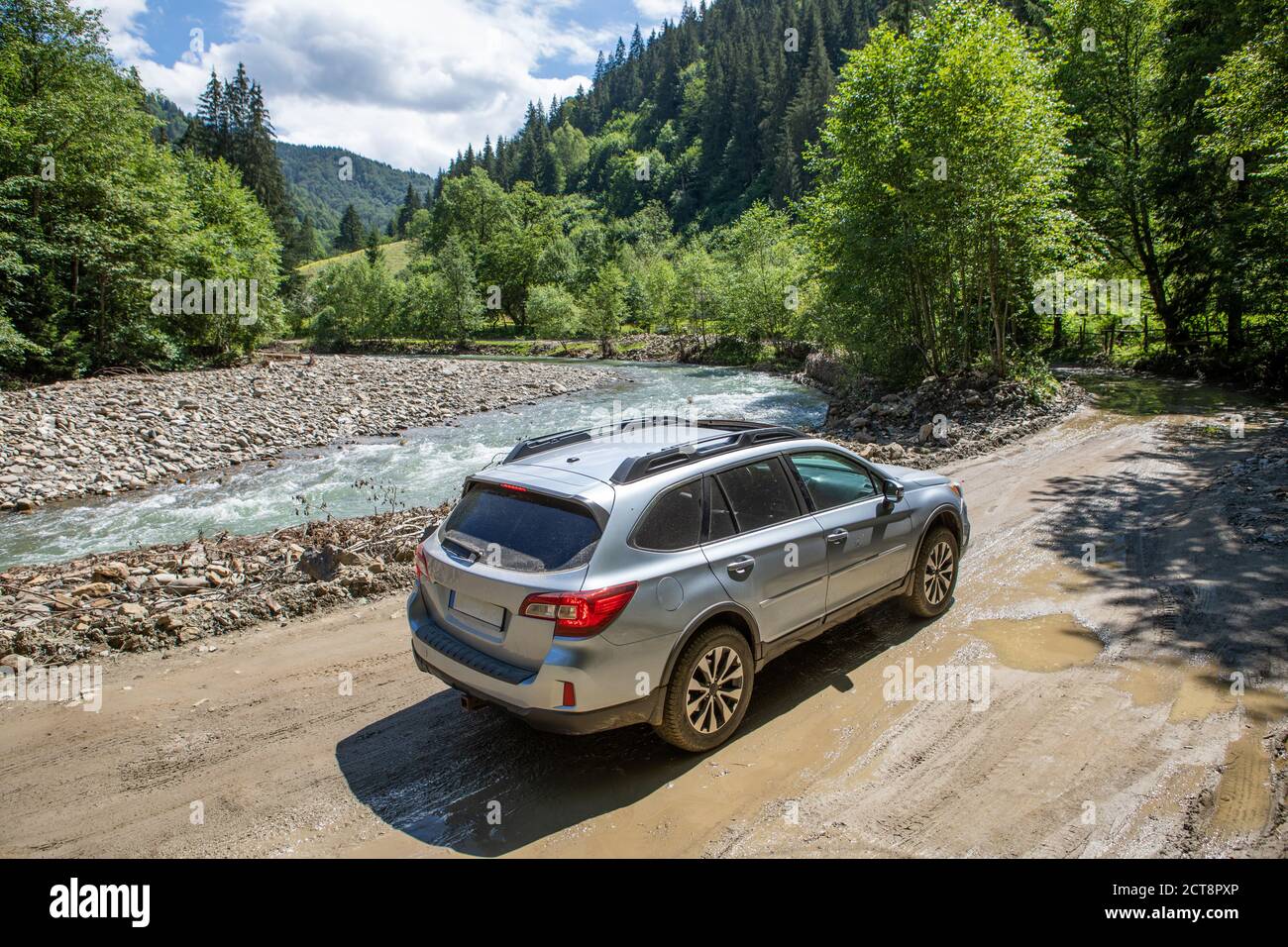suv car at mountains near river Stock Photo - Alamy