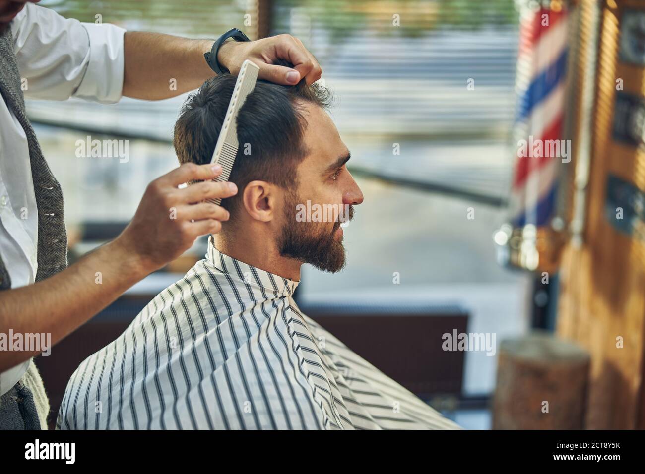 Inside interior man getting haircut hi-res stock photography and images ...