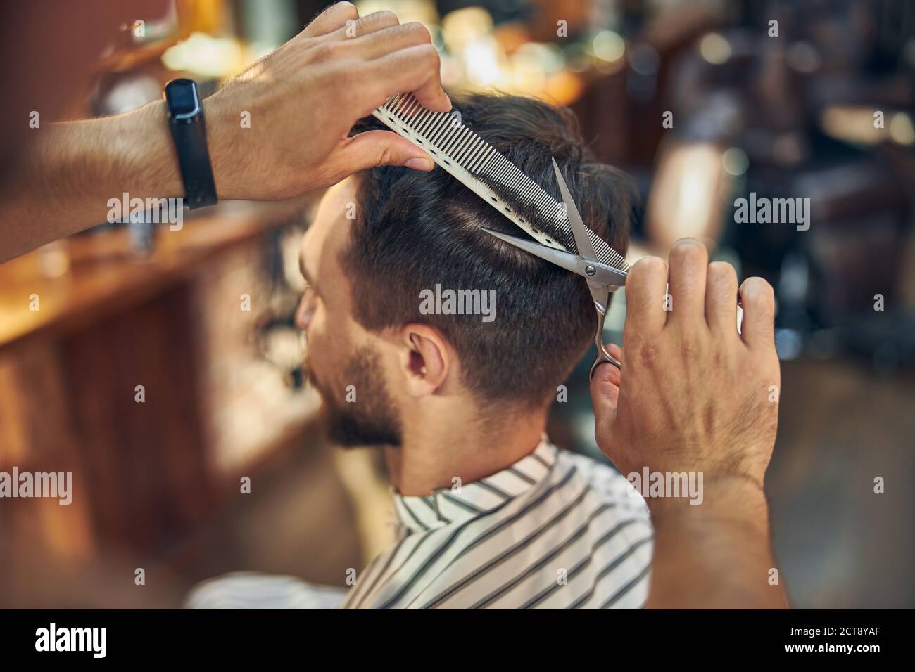 Man having hair cut salon hi-res stock photography and images - Alamy
