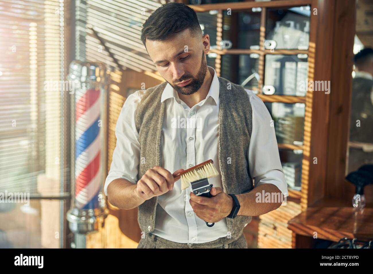 Barber cleaning hi-res stock photography and images - Alamy