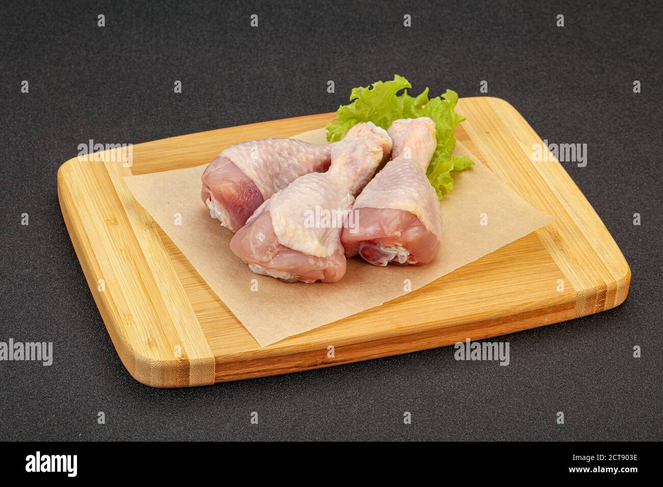 Raw chicken drumsticks ready for cooking Stock Photo - Alamy