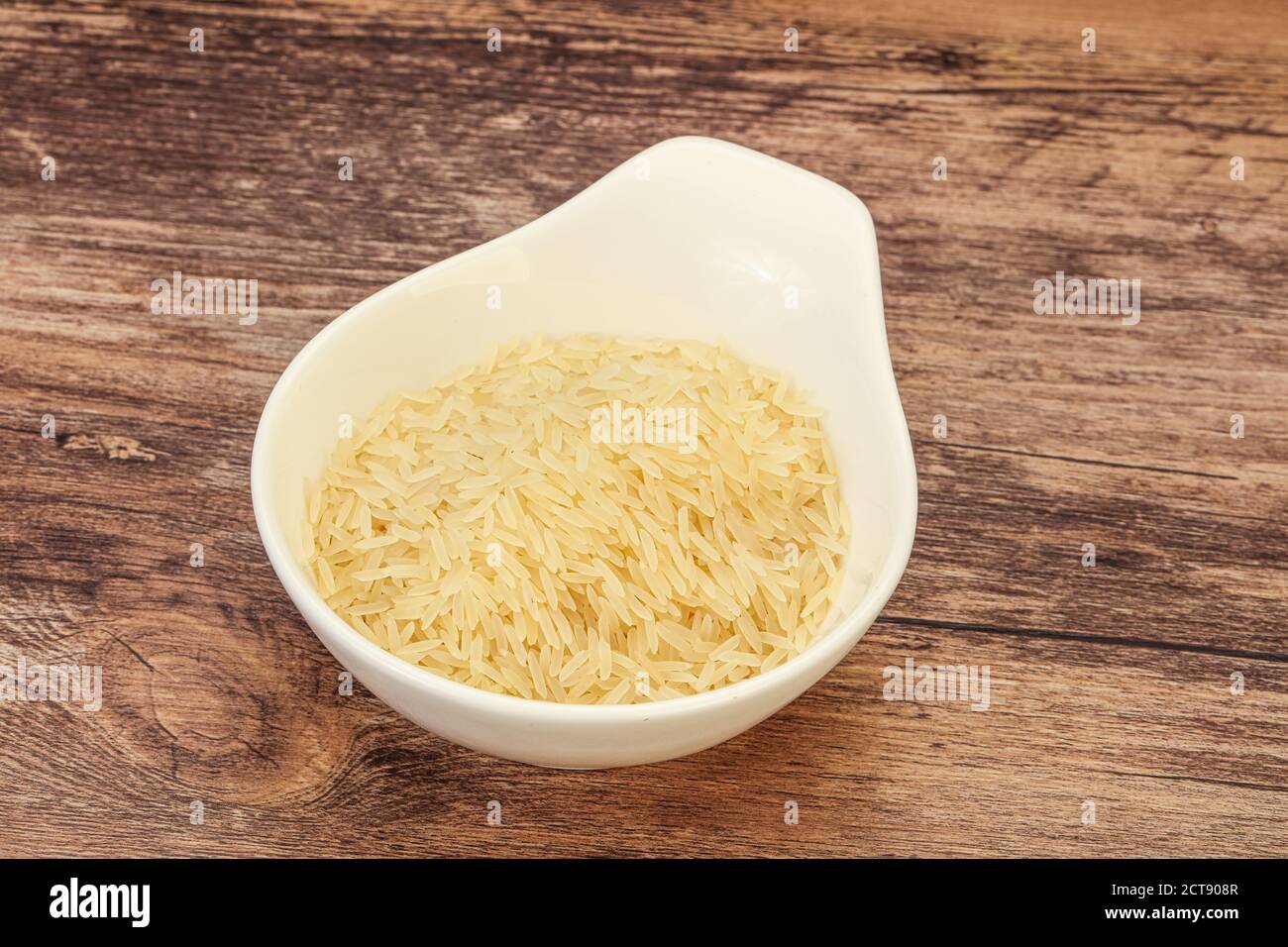 Raw Indian basmati rice in the bowl Stock Photo - Alamy
