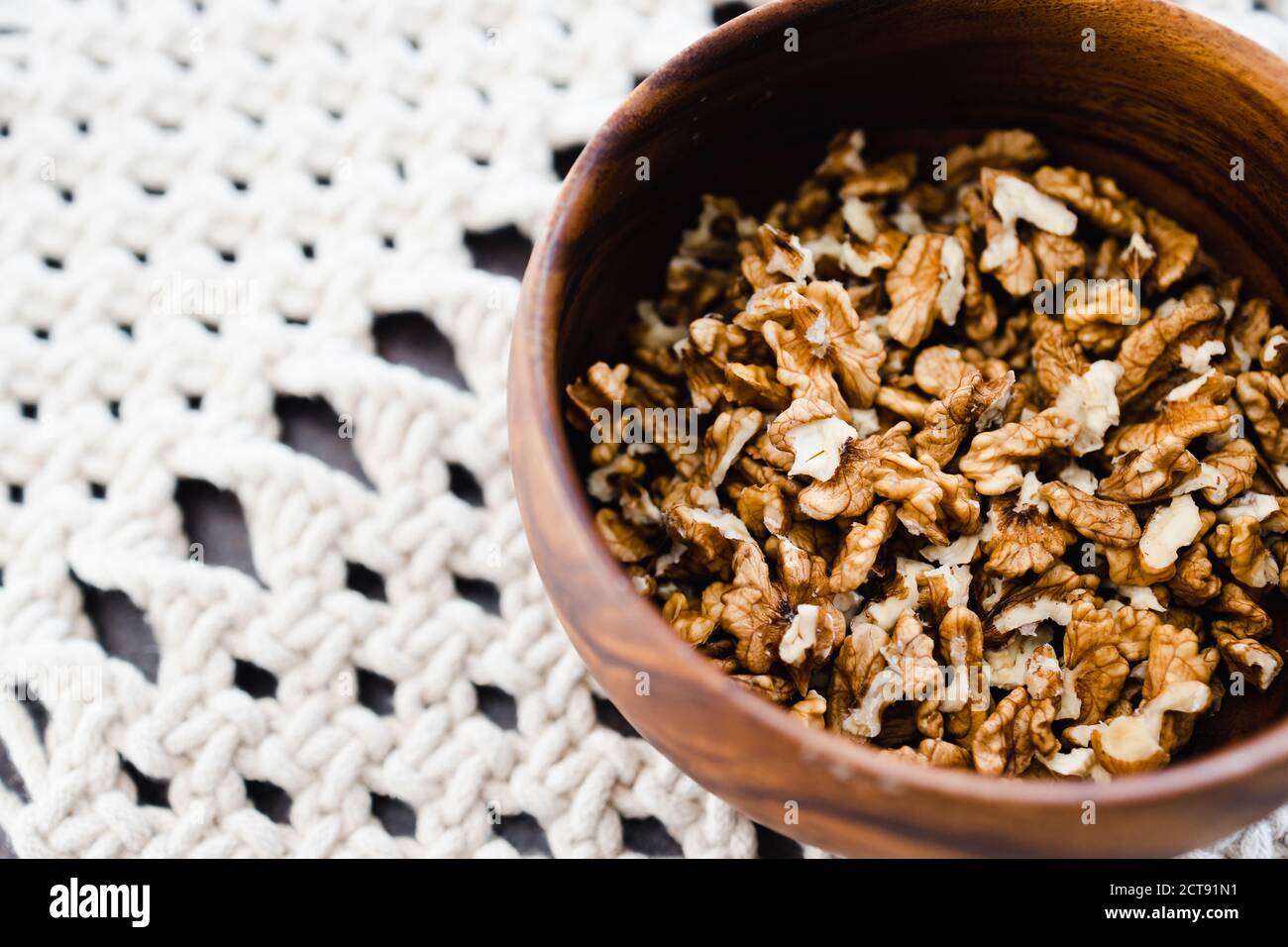 simple food ingredients concept, walnut kernels in wooden bowl on ...