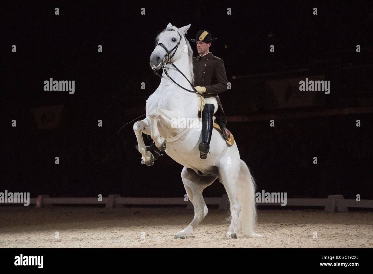 THE SPANISH RIDING SCHOOL PERFORM AT THE WEMBLEY ARENA, LONDON. PHOTO ...