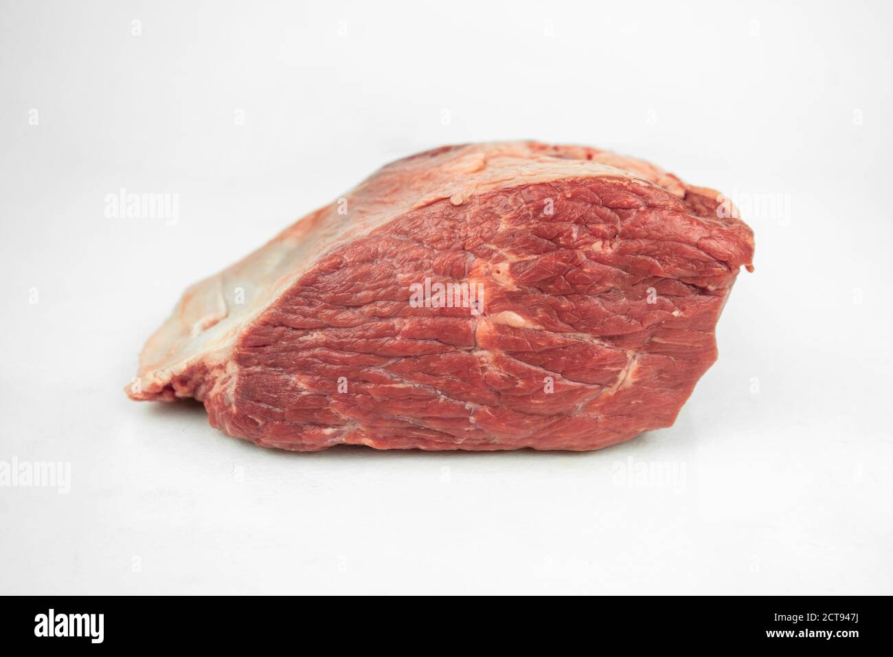 large piece of beef tenderloin, raw meat, isolated on white Stock Photo ...