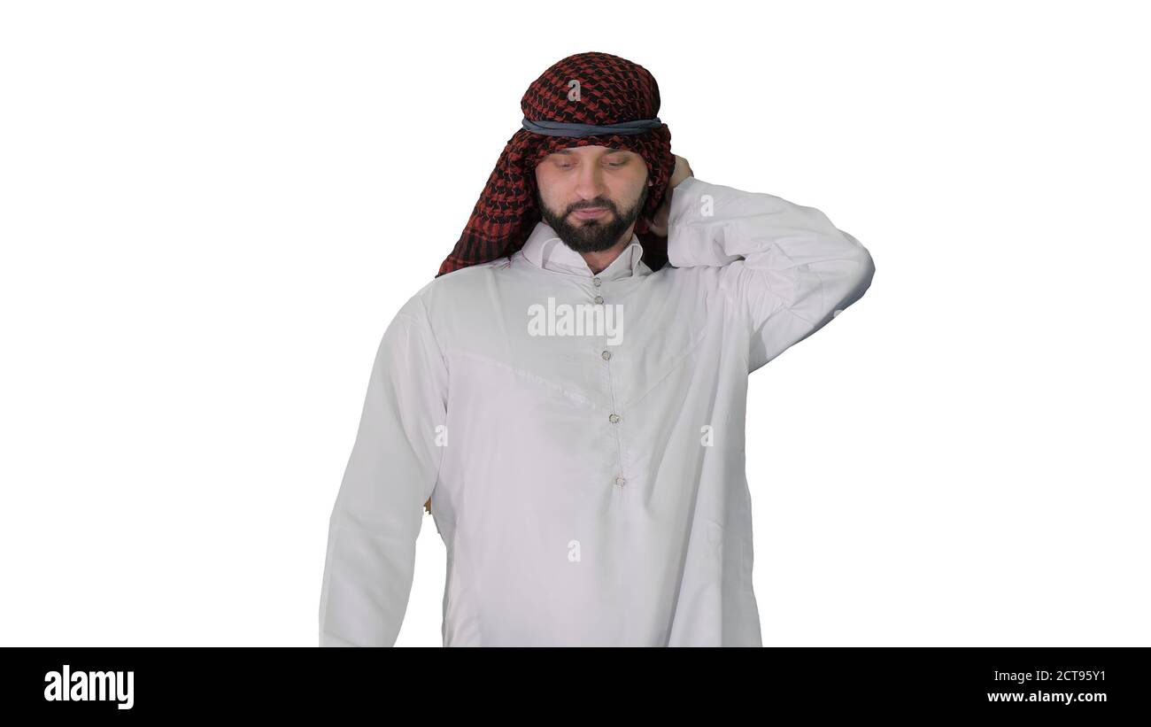 Handsome sheikh walking and looking to sides on white background Stock ...