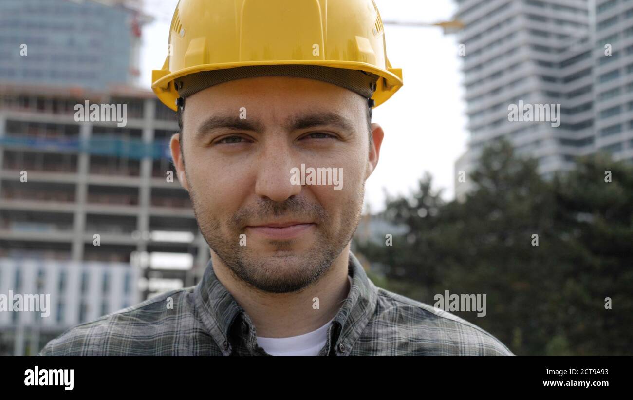Young businessman construction site engineer looking to camera Stock ...