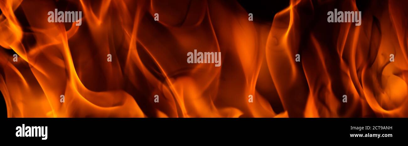 Red blaze Fire flame on a black background Stock Photo - Alamy