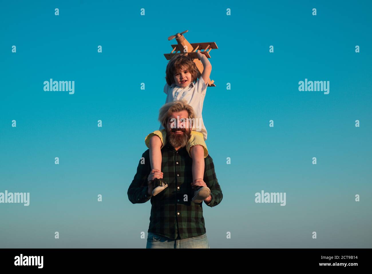 Child son pilot and dad daddy father with airplane. Happy boy Stock ...