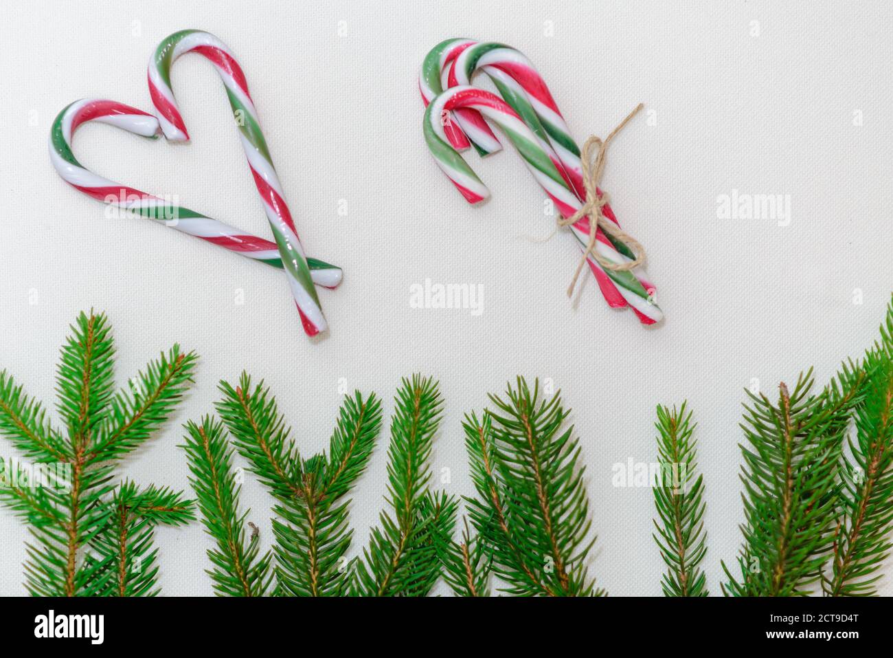 Christmas, New Year decoration background:spruce branches,, candy with ...