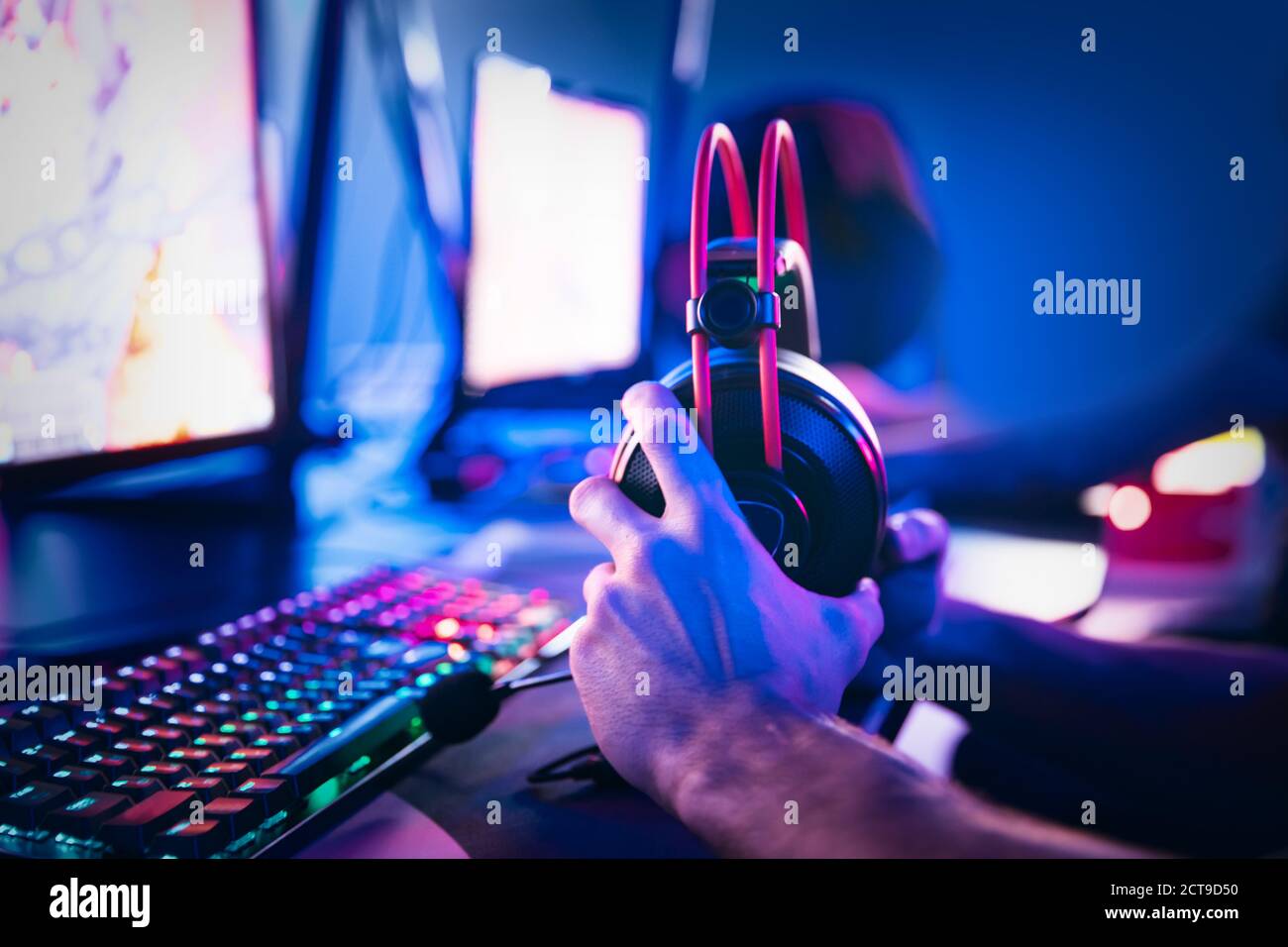 Professional cyber gamer playing online tournaments computer with ...