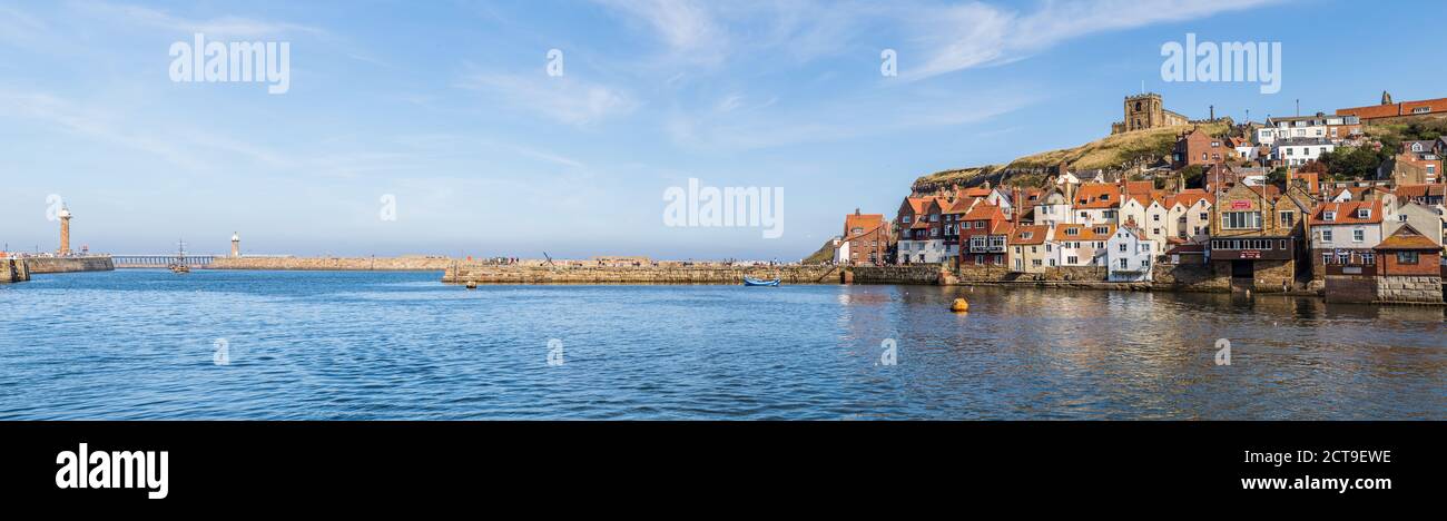 Whitby harbour entrance and East cliff panorama made up of multiple ...