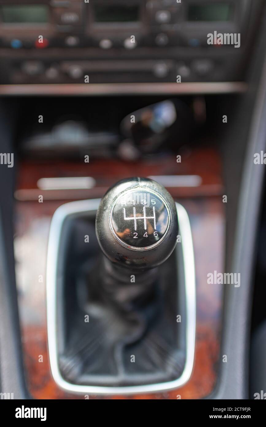 horizontal close up high angle image of a black and white manual car ...