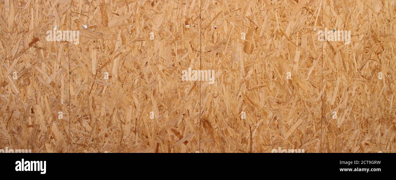 an OSB panel as background Stock Photo - Alamy