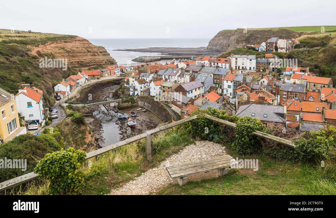 Multiple image panorama of a bench looking down on pretty fishing ...