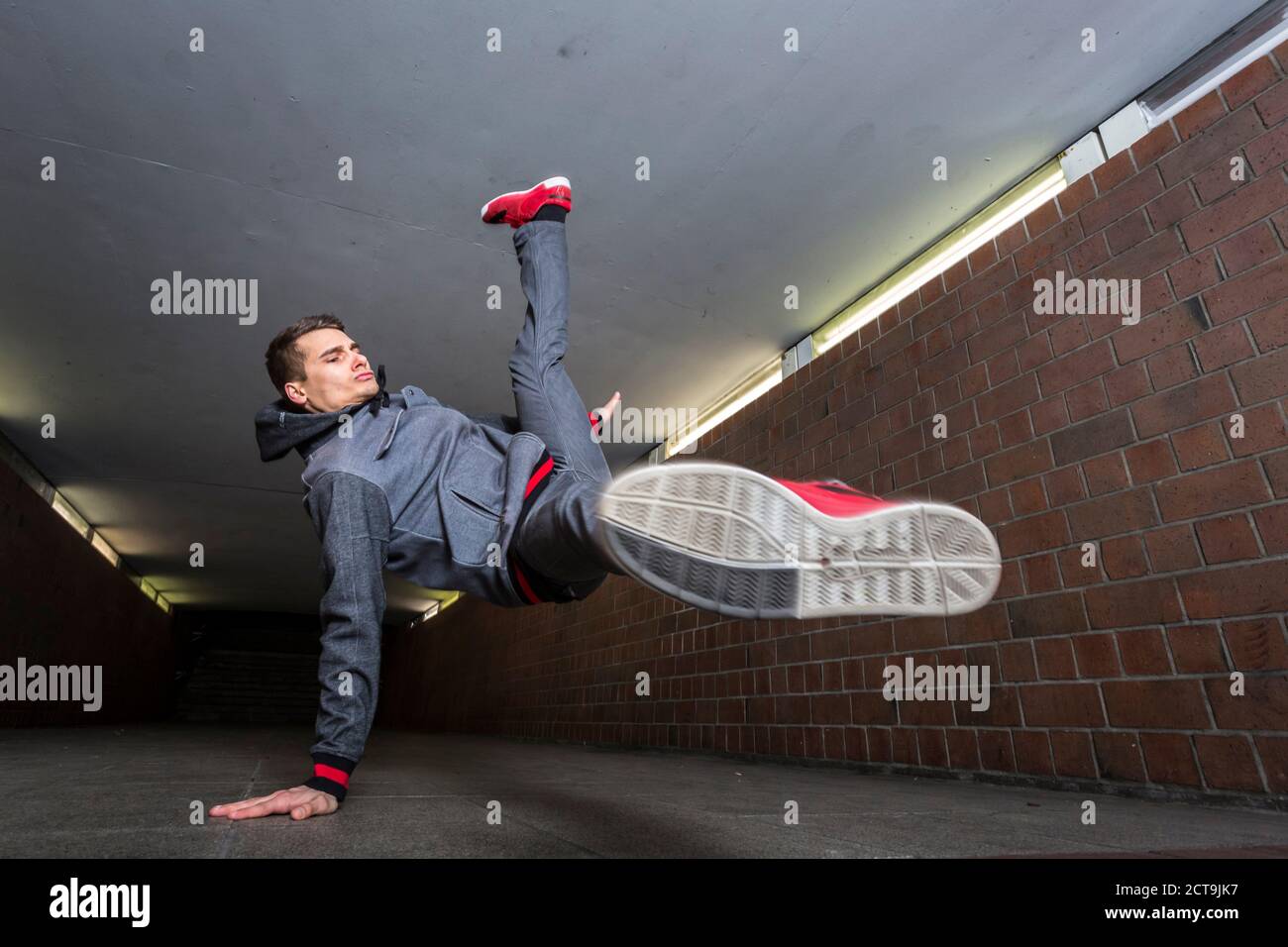 Germany, portrait of young break dancer in underpass Stock Photo - Alamy