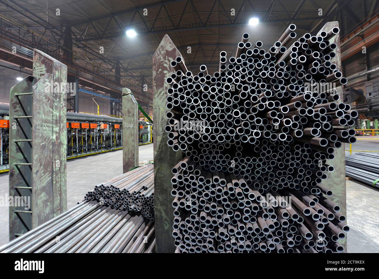 Storage of finished pipes in a tube rolling mill Stock Photo - Alamy
