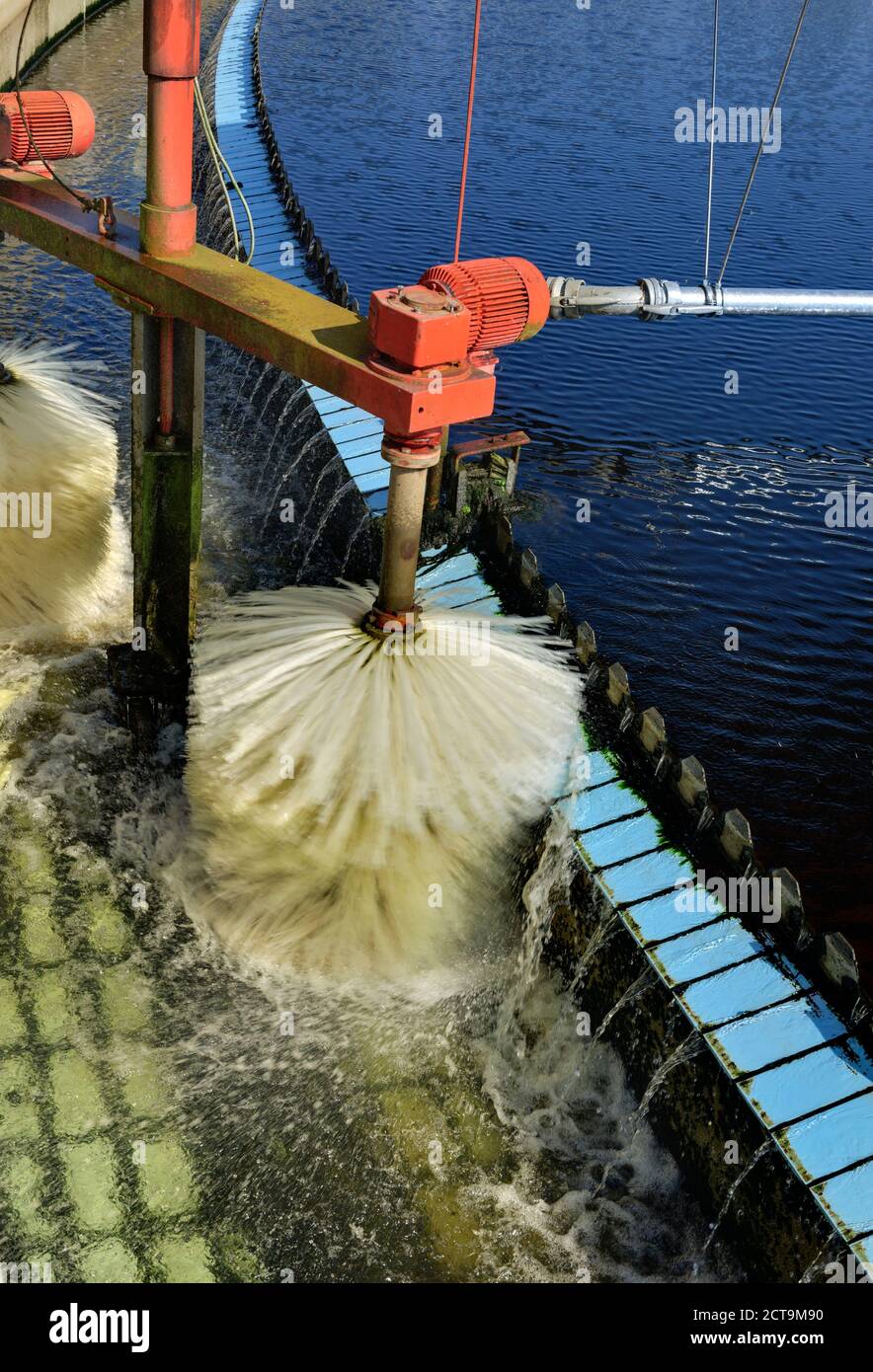 Germany, Baden-Wurttemberg, Cleaning of sedimentation tank of water ...