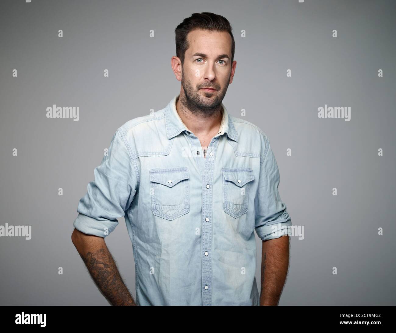 Portrait of serious looking man Stock Photo - Alamy