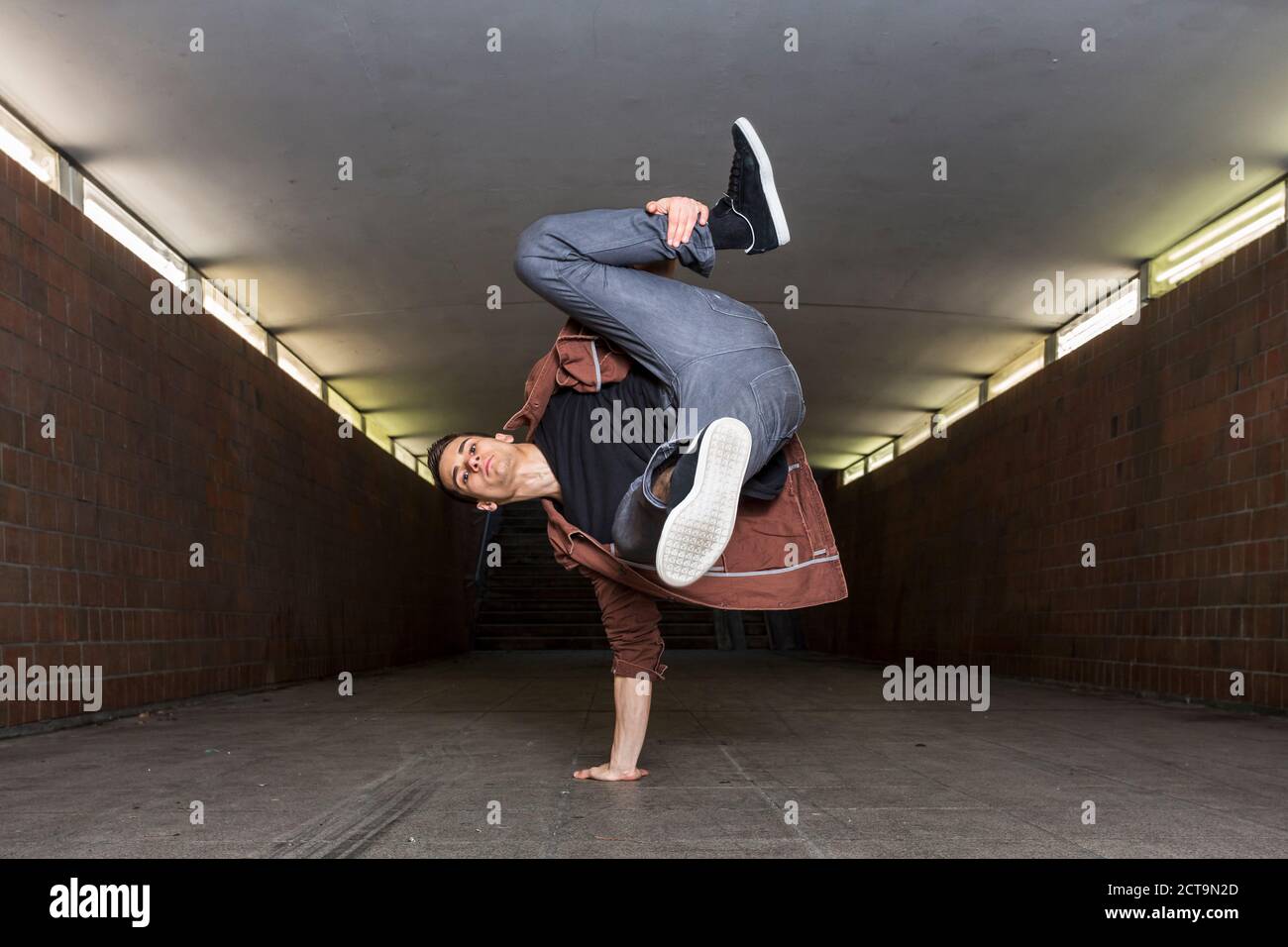 Germany, portrait of young break dancer in underpass Stock Photo - Alamy