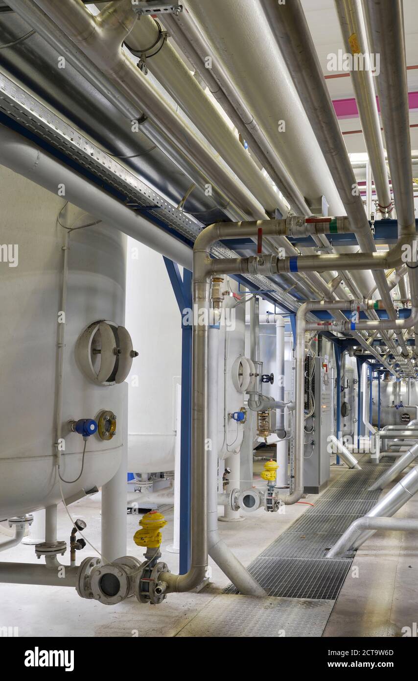 Pipeworks in industrial hall Stock Photo - Alamy