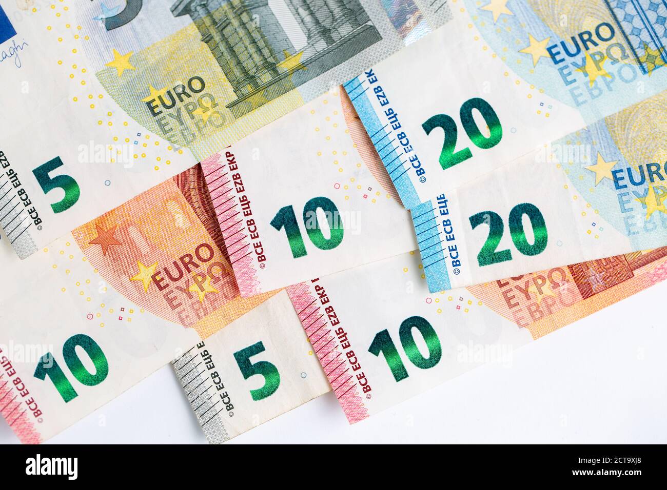 Top view of twenty, ten and five euro bills isolated on white ...