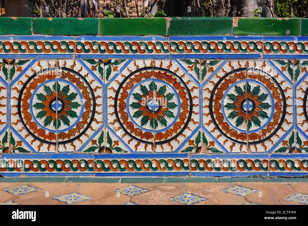 Azulejos, typical Spanish tilework decorating a bench in the Alcazar of ...