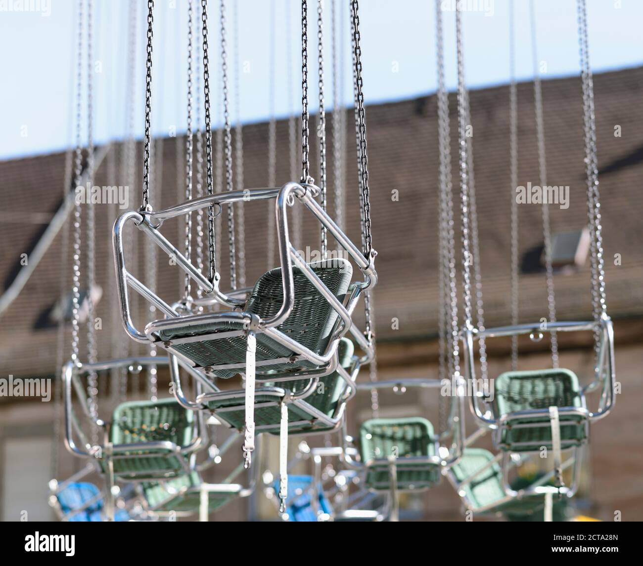 Germany, Bavaria, Fuerth, Kirchweih, chairoplane, seats Stock Photo - Alamy