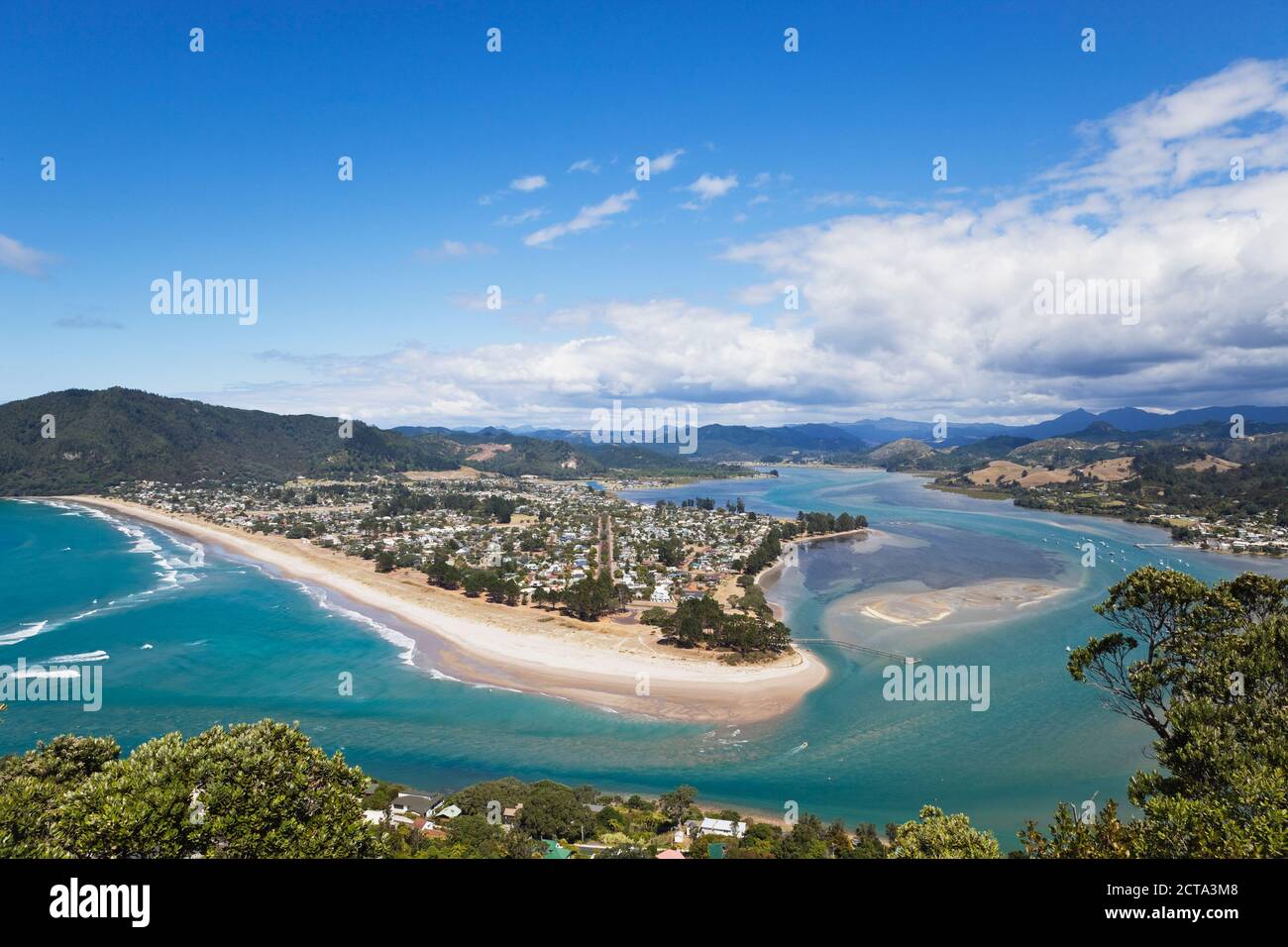 New Zealand, Coromandel Peninsula, View of Pauanui village and beach ...