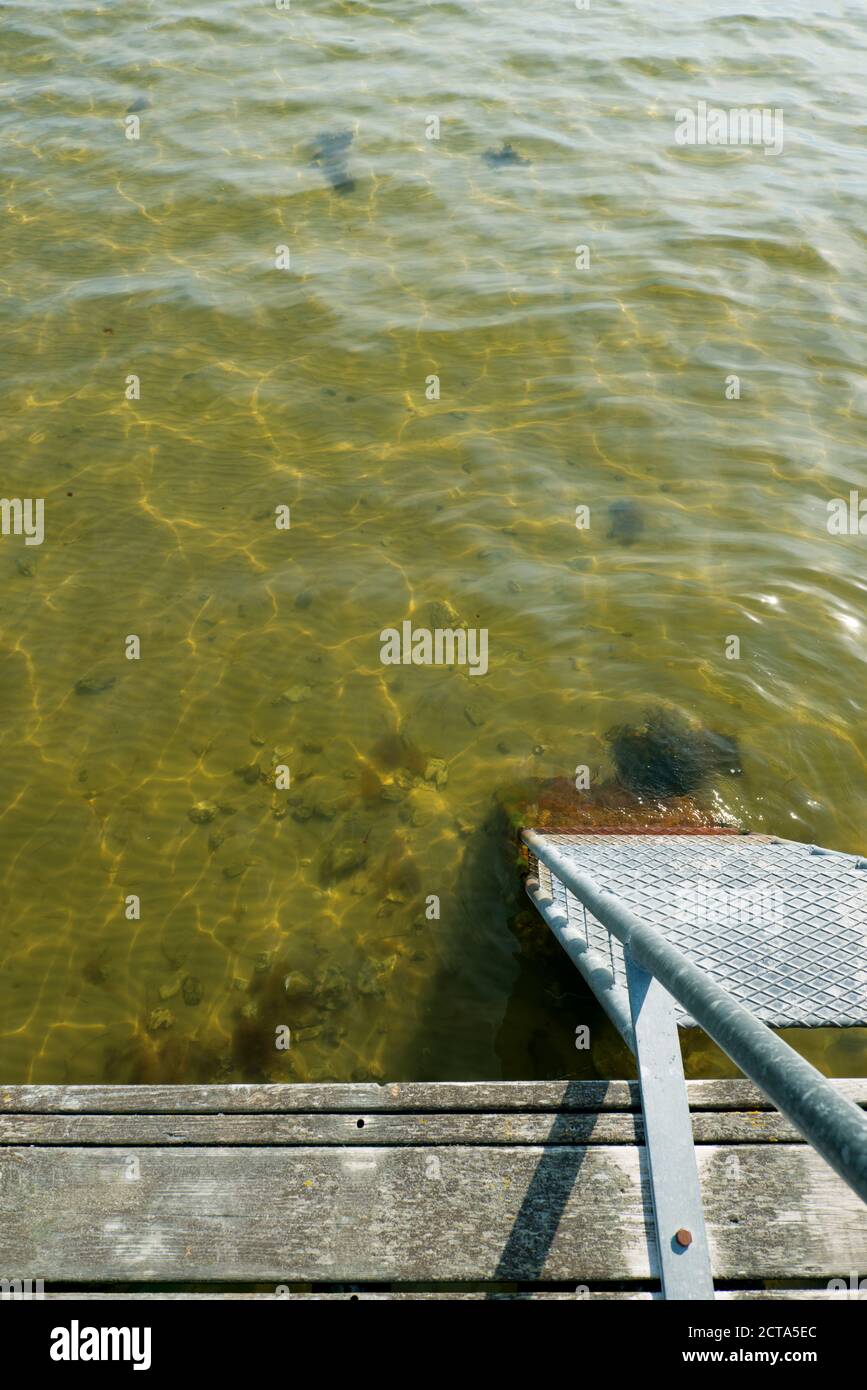 Sweden, Trelleborg, part of metal ladder at beach Stock Photo - Alamy