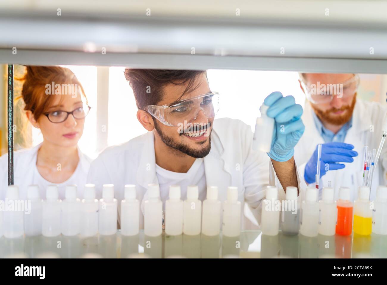 Group of students working at the laboratory Stock Photo - Alamy