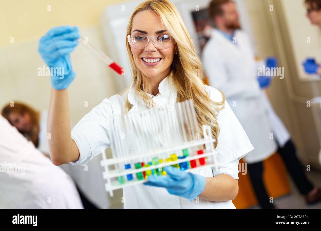 Young attractive female scientist researching in the laboratory Stock ...