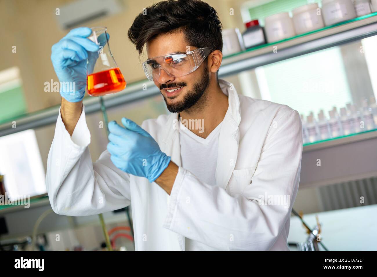 Young professional medical scientist working hi-res stock photography ...